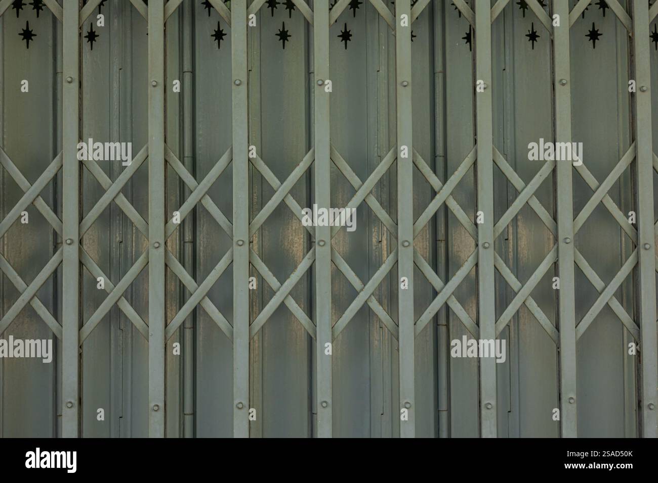 The texture of metal gates used to close shops at night. Textures and ...