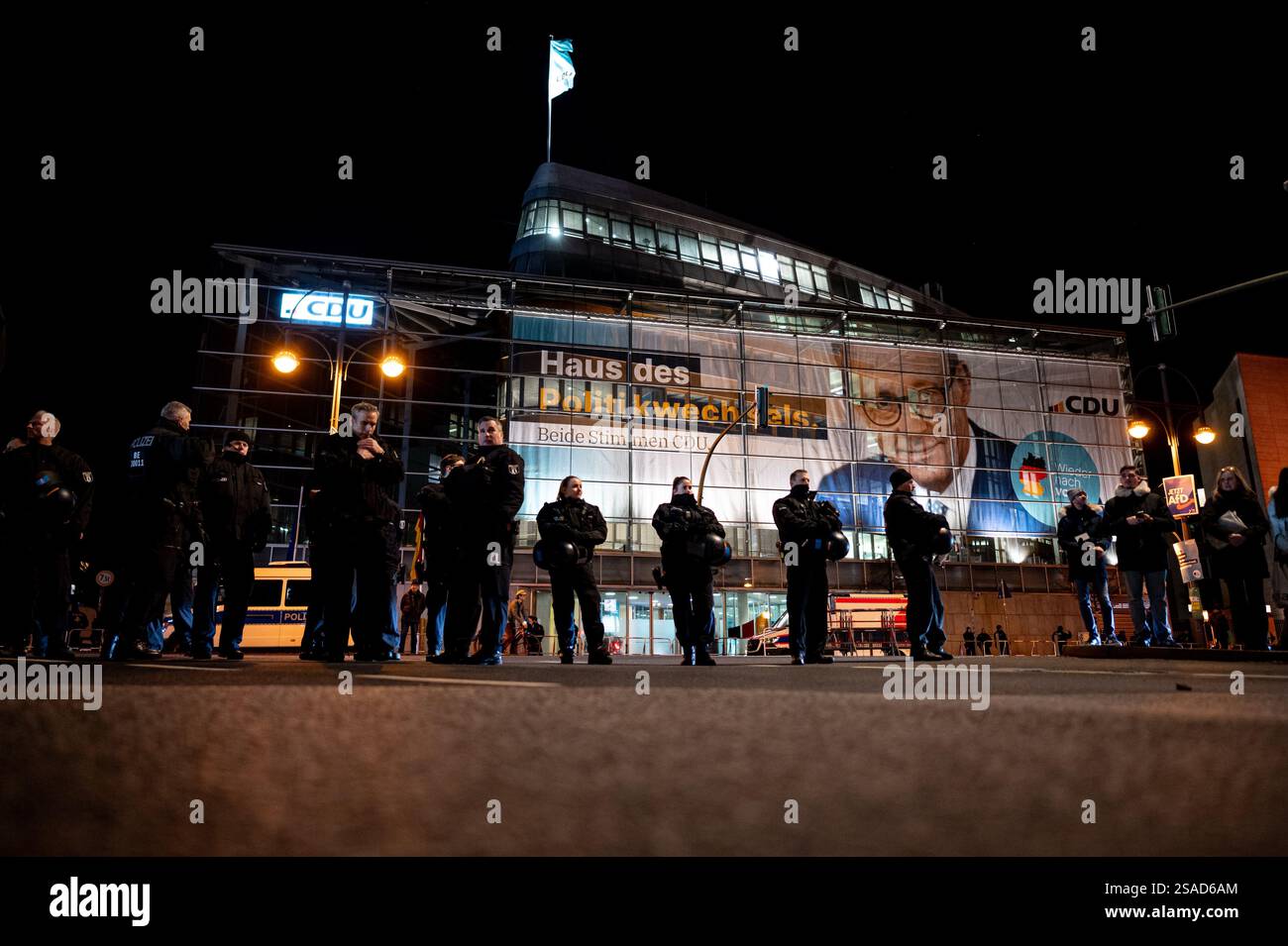 Berlin, Germany. 29th Jan, 2025. Police officers stand in front of the ...