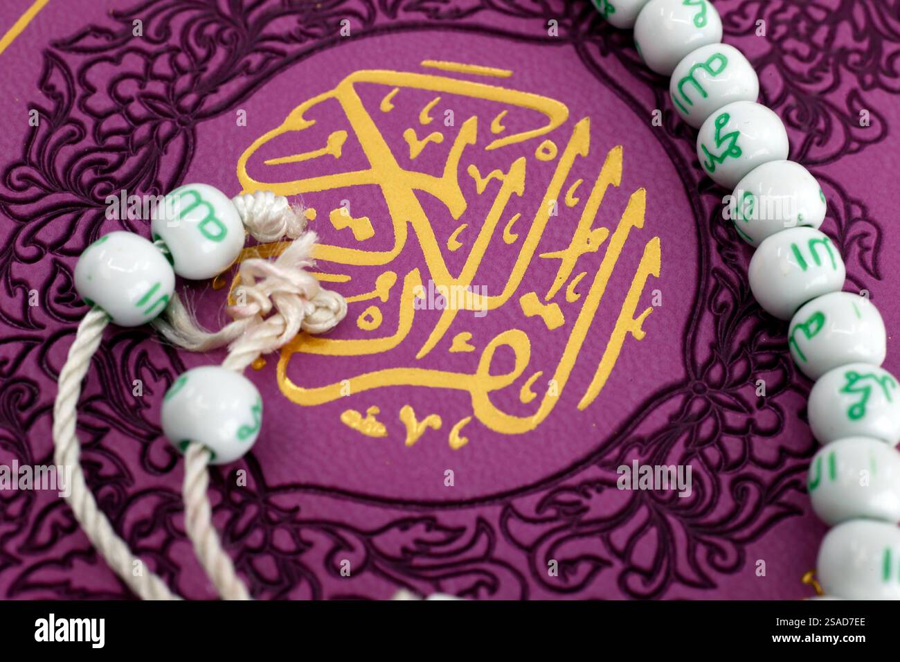 Tasbih ( muslim prayer beads ) and the Koran (Quran) - Islamic sacred ...