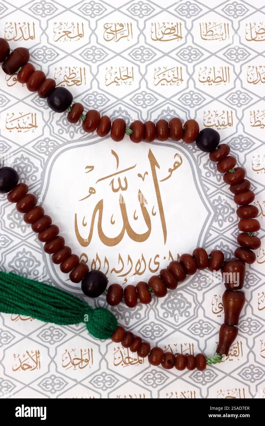 Tasbih ( muslim prayer beads ) and the Koran (Quran). Islamic sacred ...