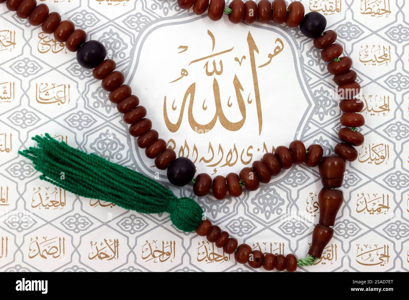 Tasbih ( muslim prayer beads ) and the Koran (Quran). Islamic sacred ...