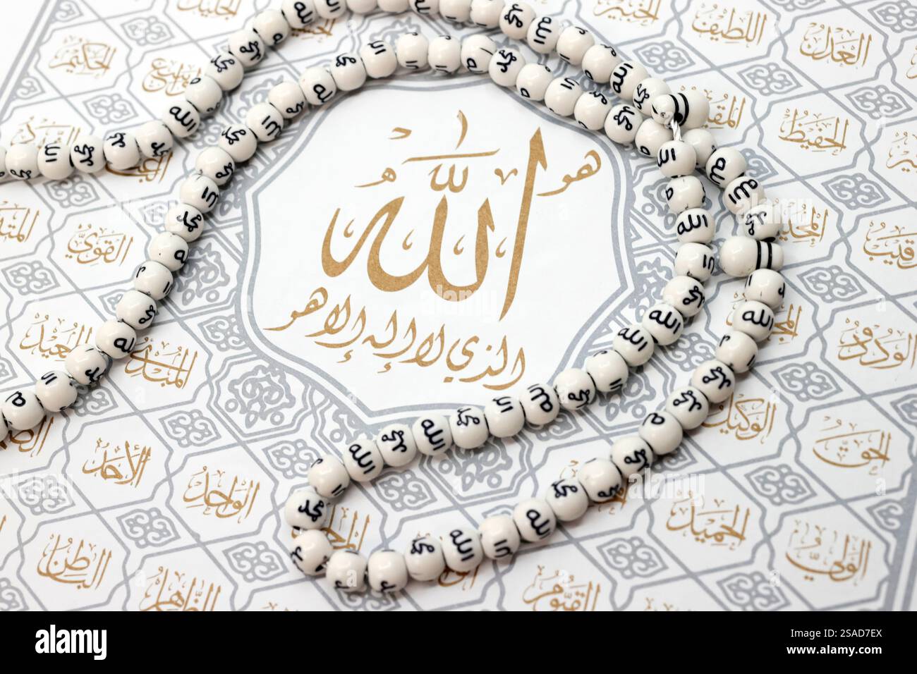 Tasbih ( muslim prayer beads ) and the Koran (Quran). Islamic sacred ...