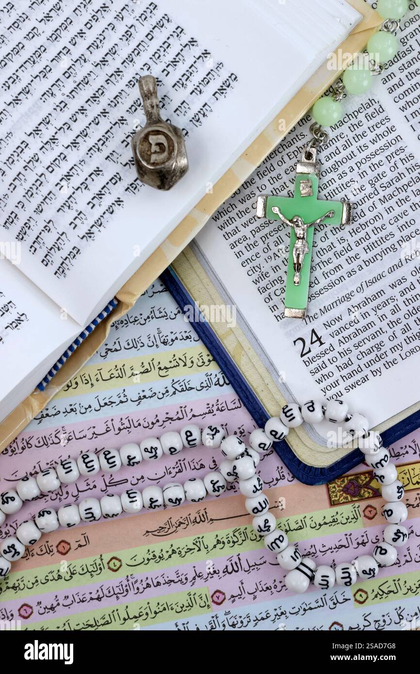 Bible, Quran and Torah with symbols of religions. Concept of interfaith ...
