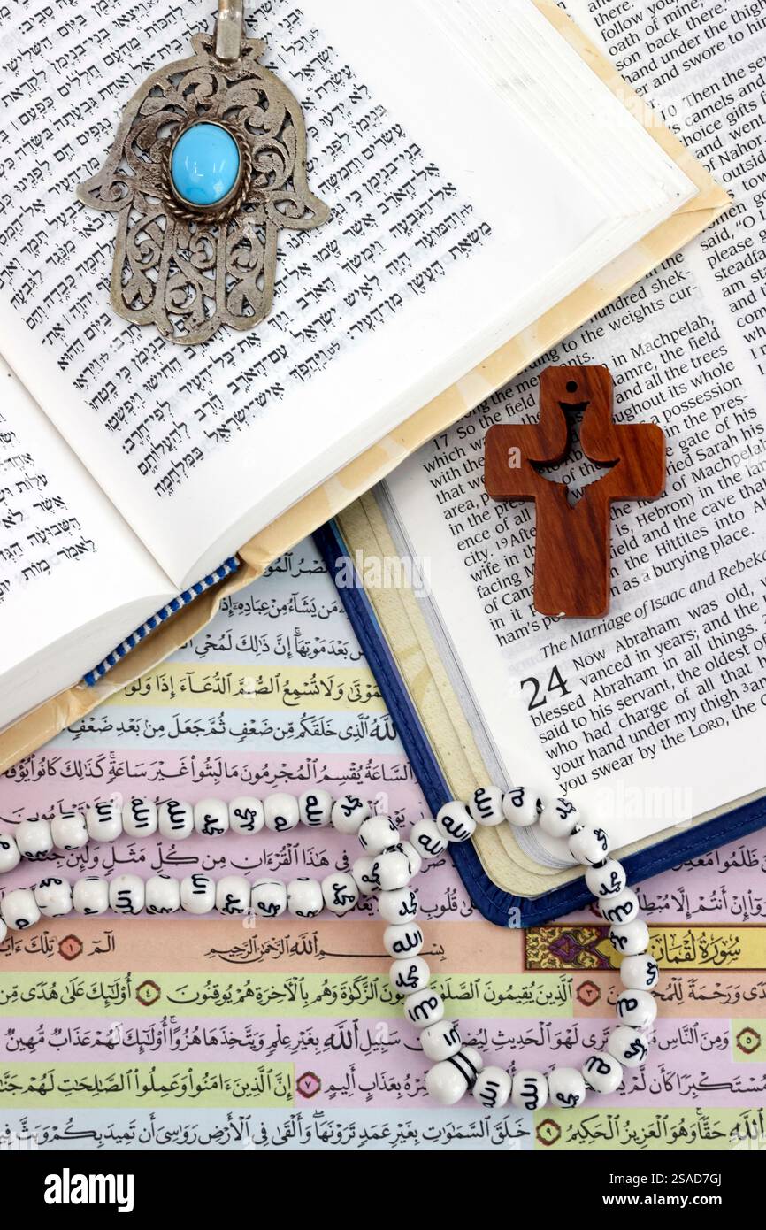 Bible, Quran and Torah with symbols of religions. Concept of interfaith ...