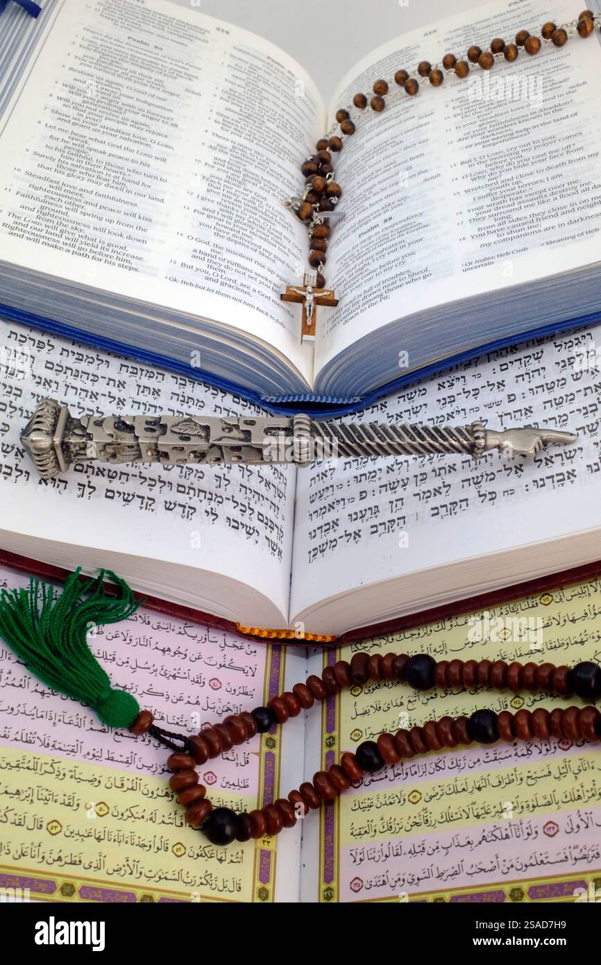 Bible, Quran and Torah. Concept of interfaith dialogue. Christianity ...