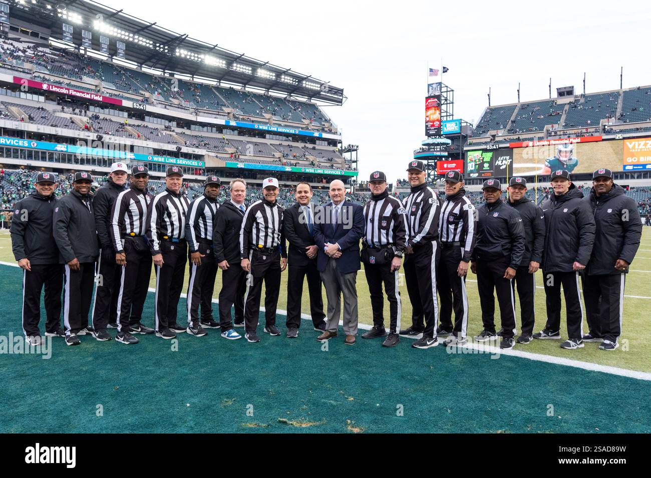 NFL officiating crew (left to right) 3 reserve officials, line judge ...