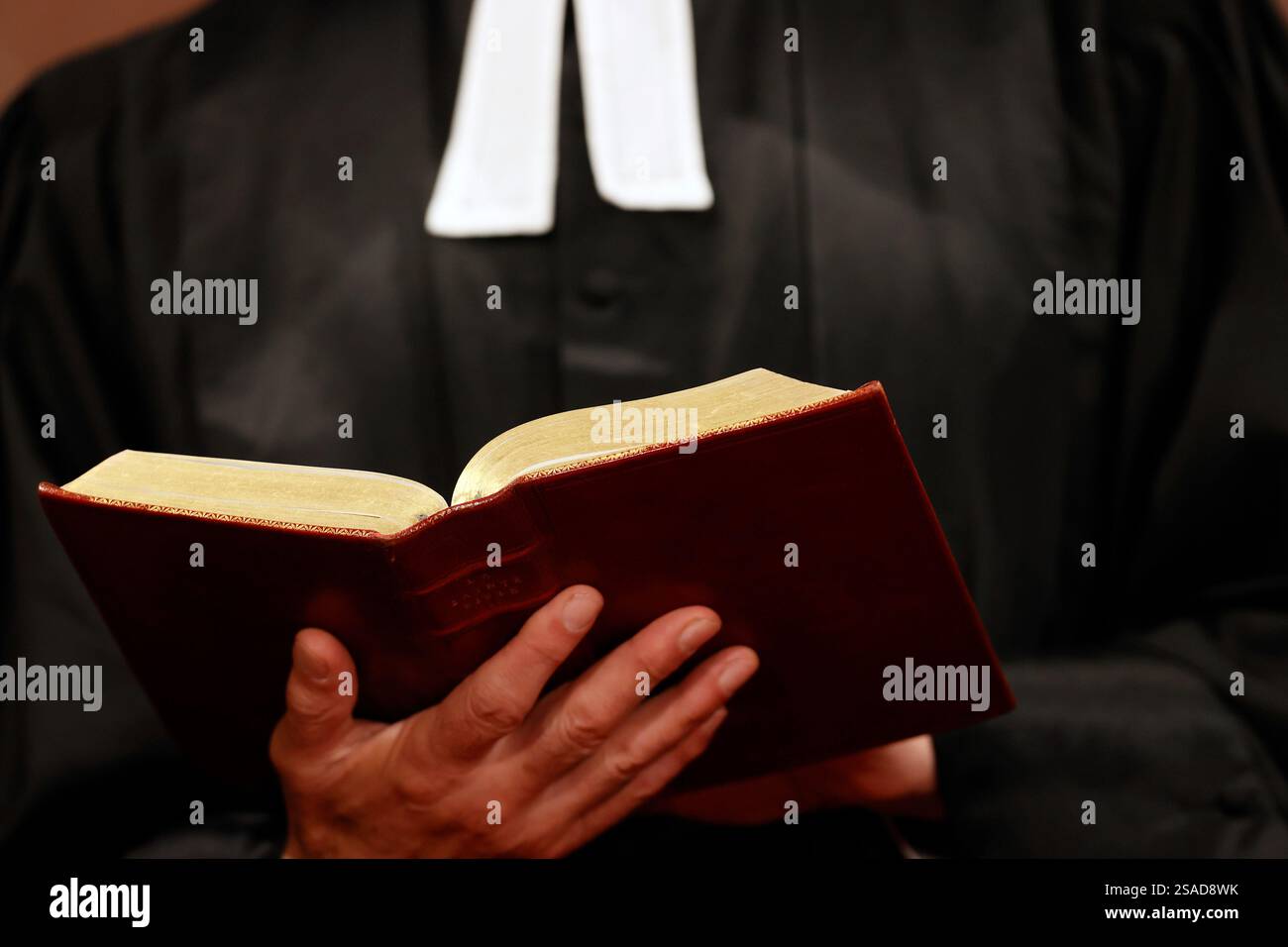 Sunday service in a Protestant church. Pastor reading the Bible. Paris ...