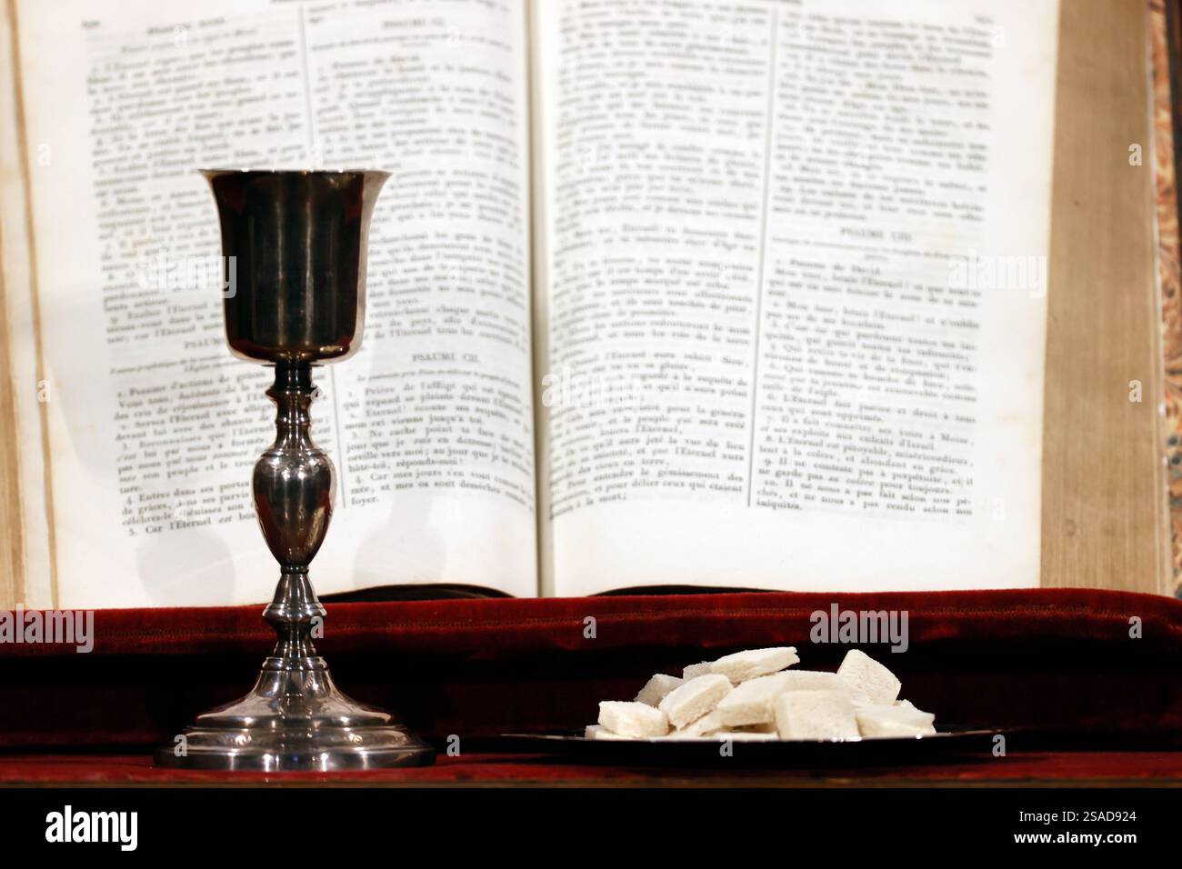 Protestant church. Bible, vine and bread on altar. Communion in memory ...