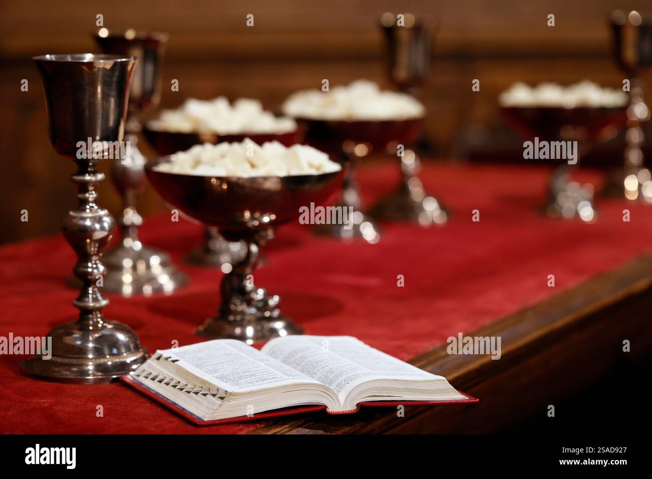 Protestant church. Bible, vine and bread on altar. Communion in memory ...
