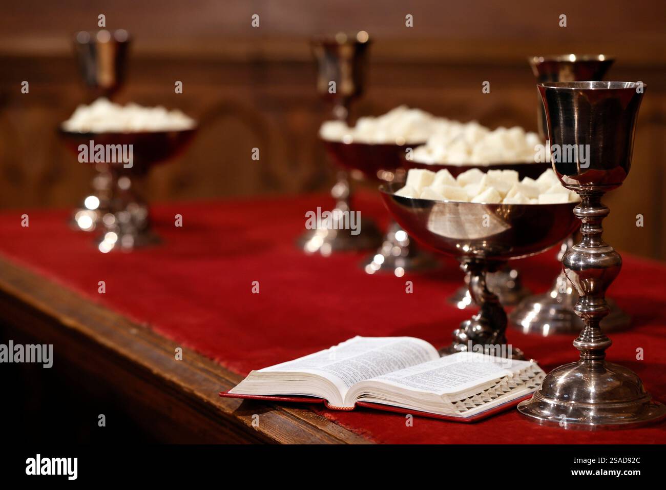 Protestant church. Bible, vine and bread on altar. Communion in memory ...