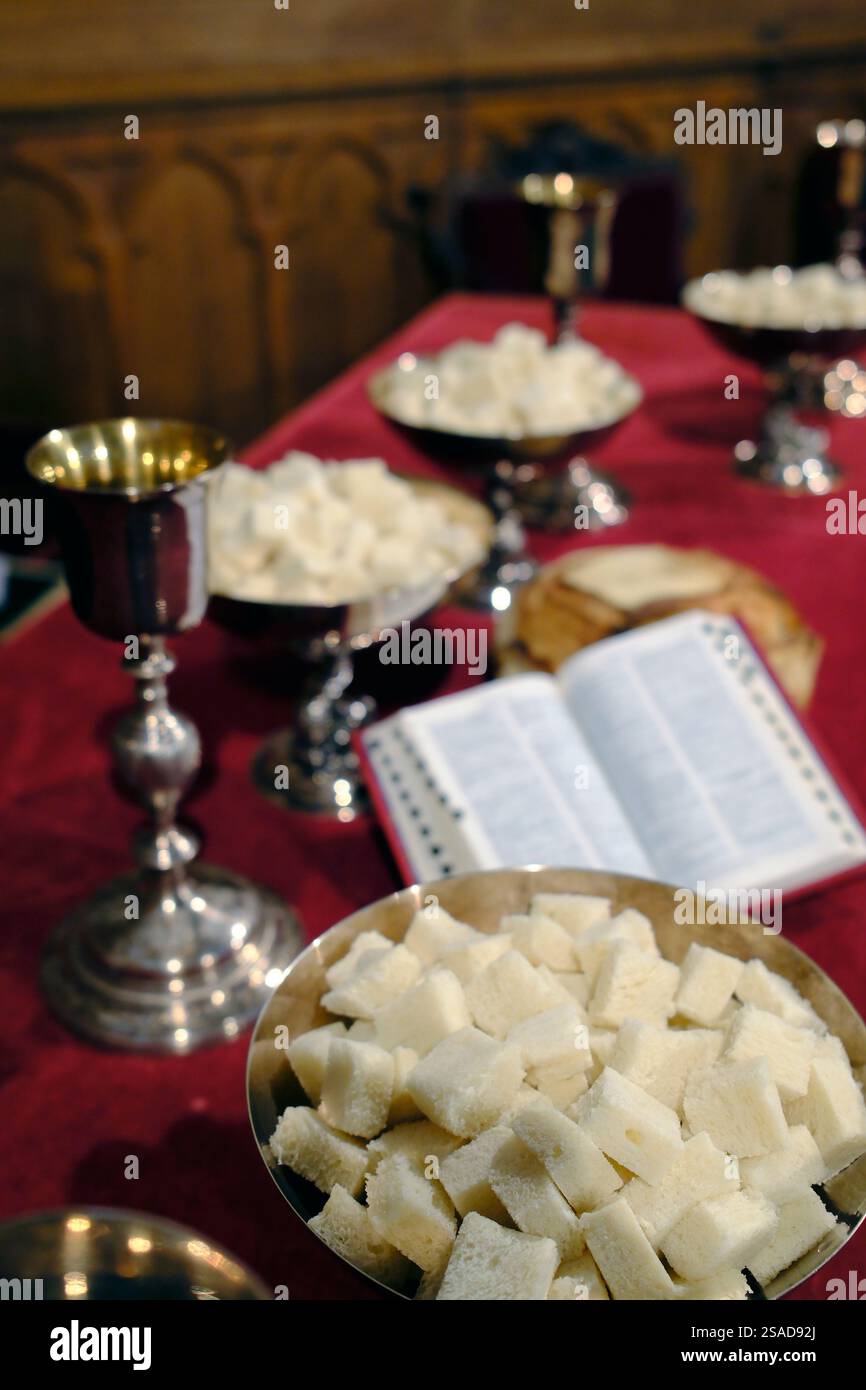 Protestant church. Bible, vine and bread on altar. Communion in memory ...