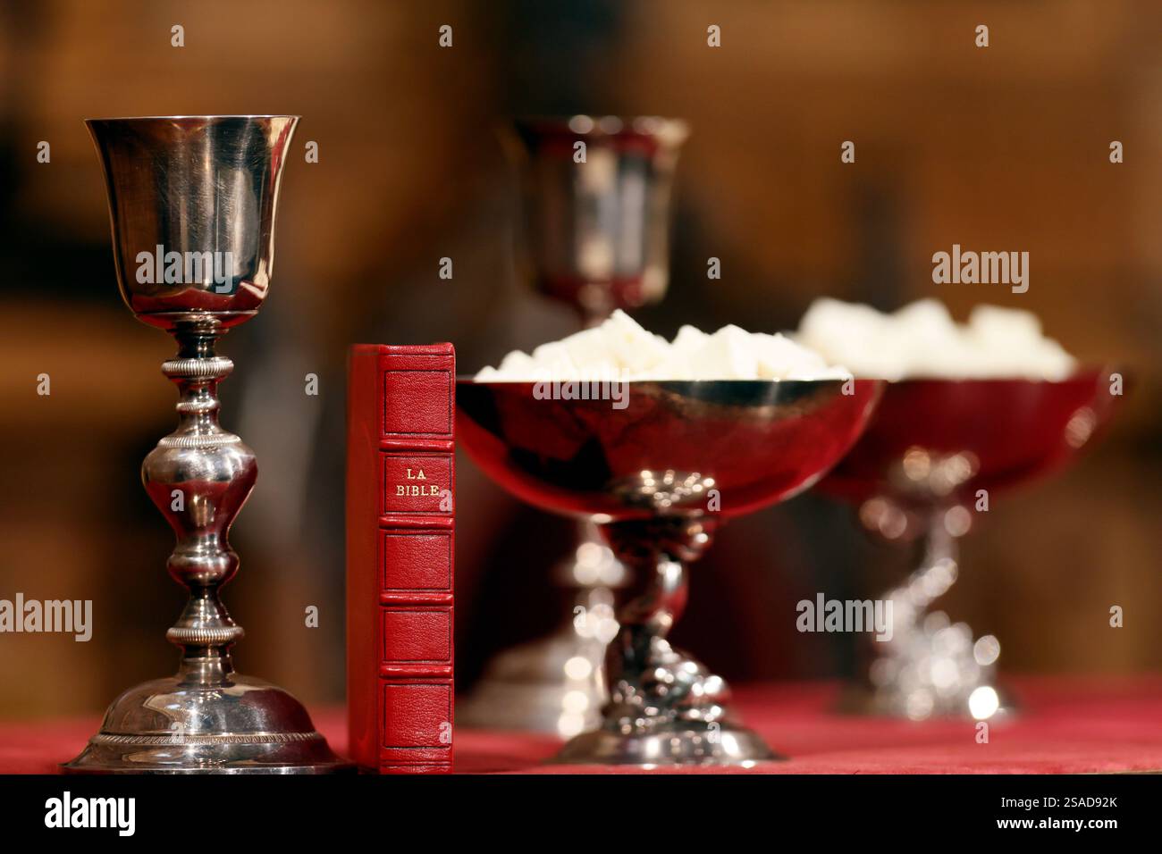 Protestant church. Bible, vine and bread on altar. Communion in memory ...