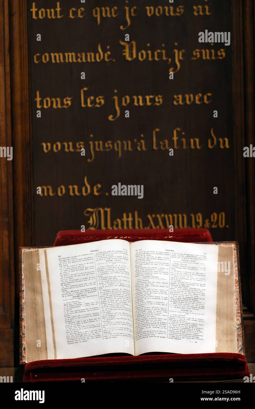 Old bible open in a church. Paris. France Stock Photo - Alamy