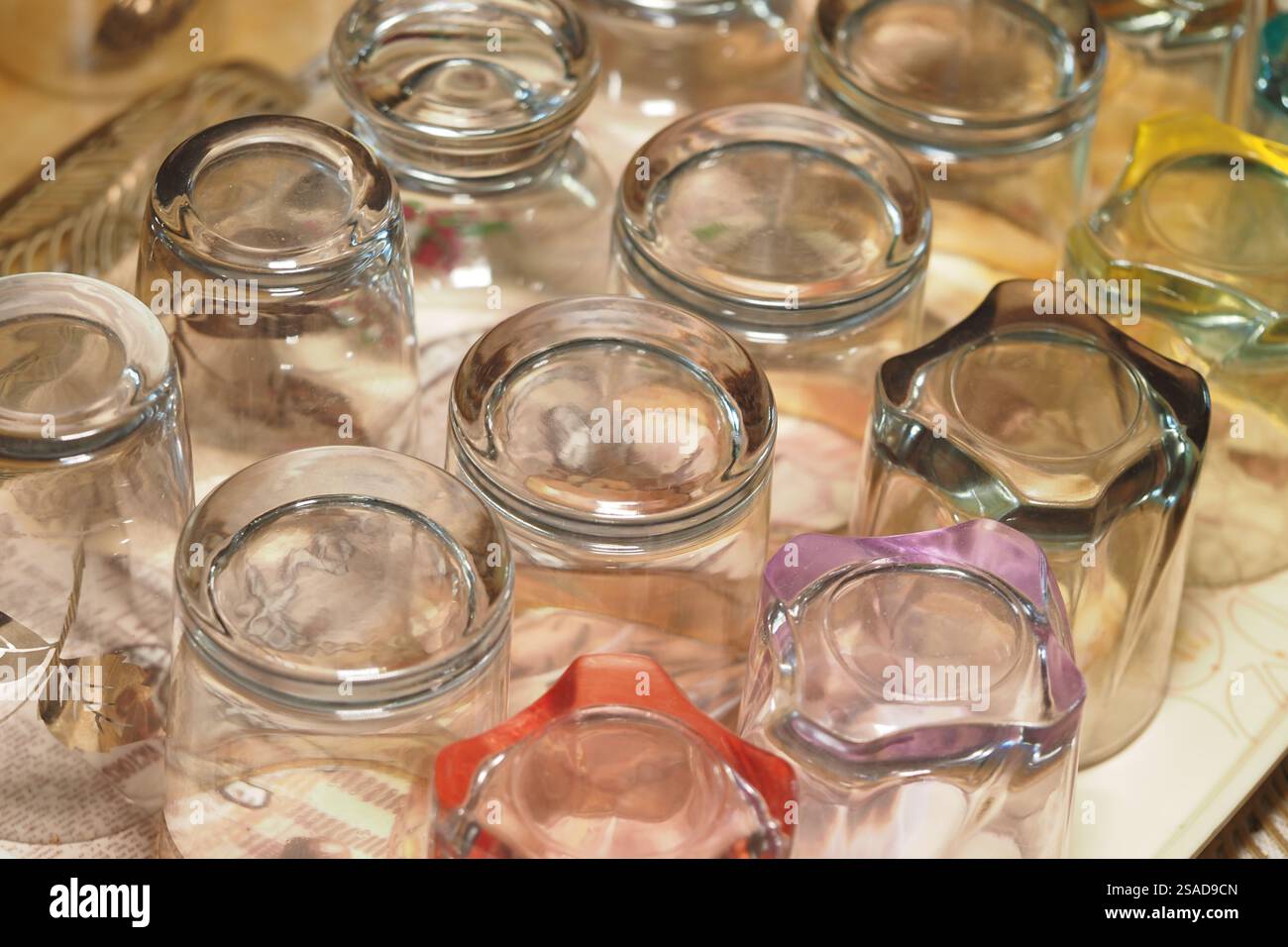 Glass jars arranged aesthetically on a surface Stock Photo - Alamy