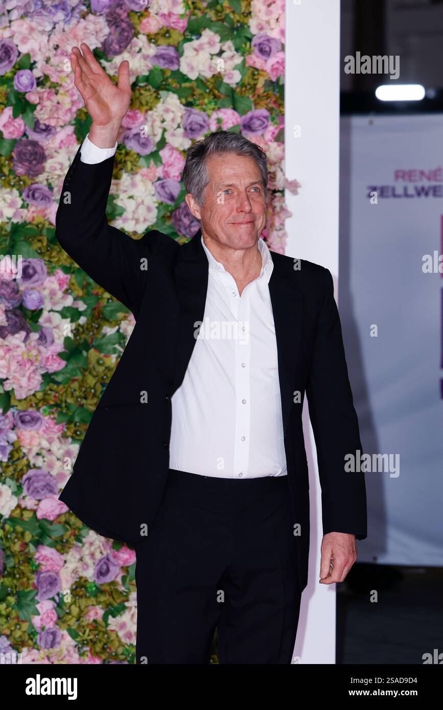 Hugh Grant poses for photographers upon arrival at the World premiere of the film ' Bridget ...