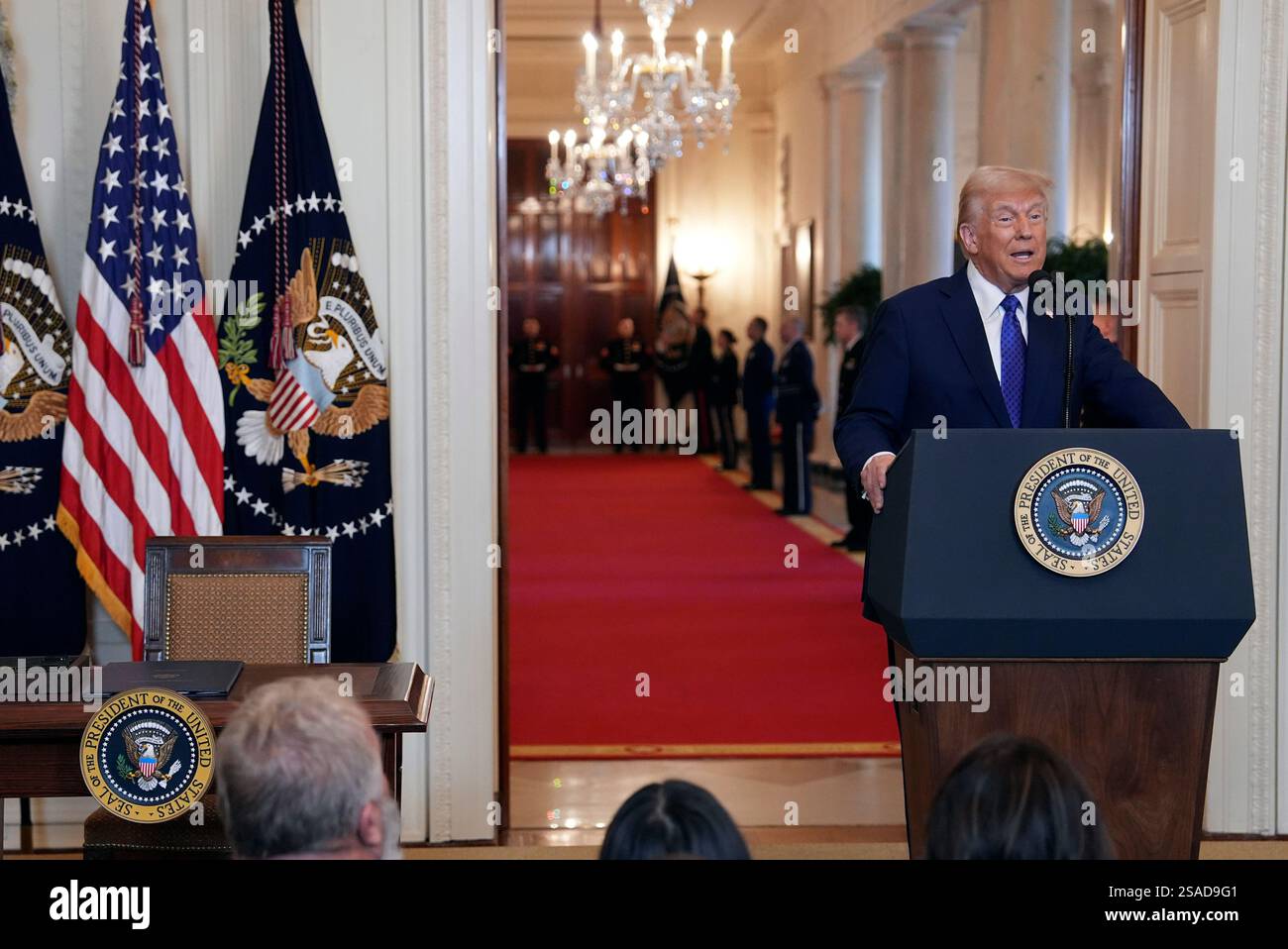 President Donald Trump speaks before signing the Laken Riley Act in the ...