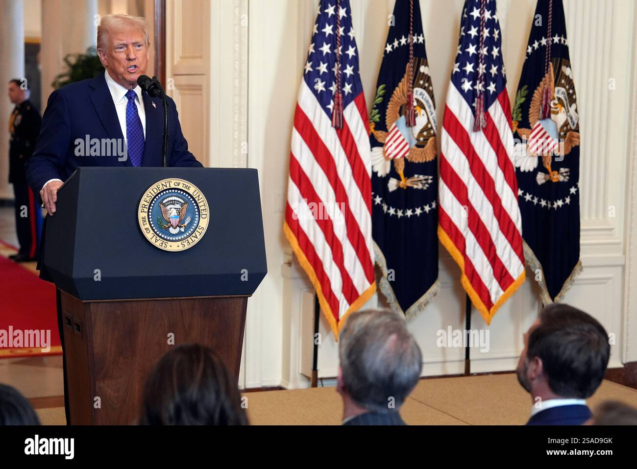 President Donald Trump speaks before signing the Laken Riley Act in the ...