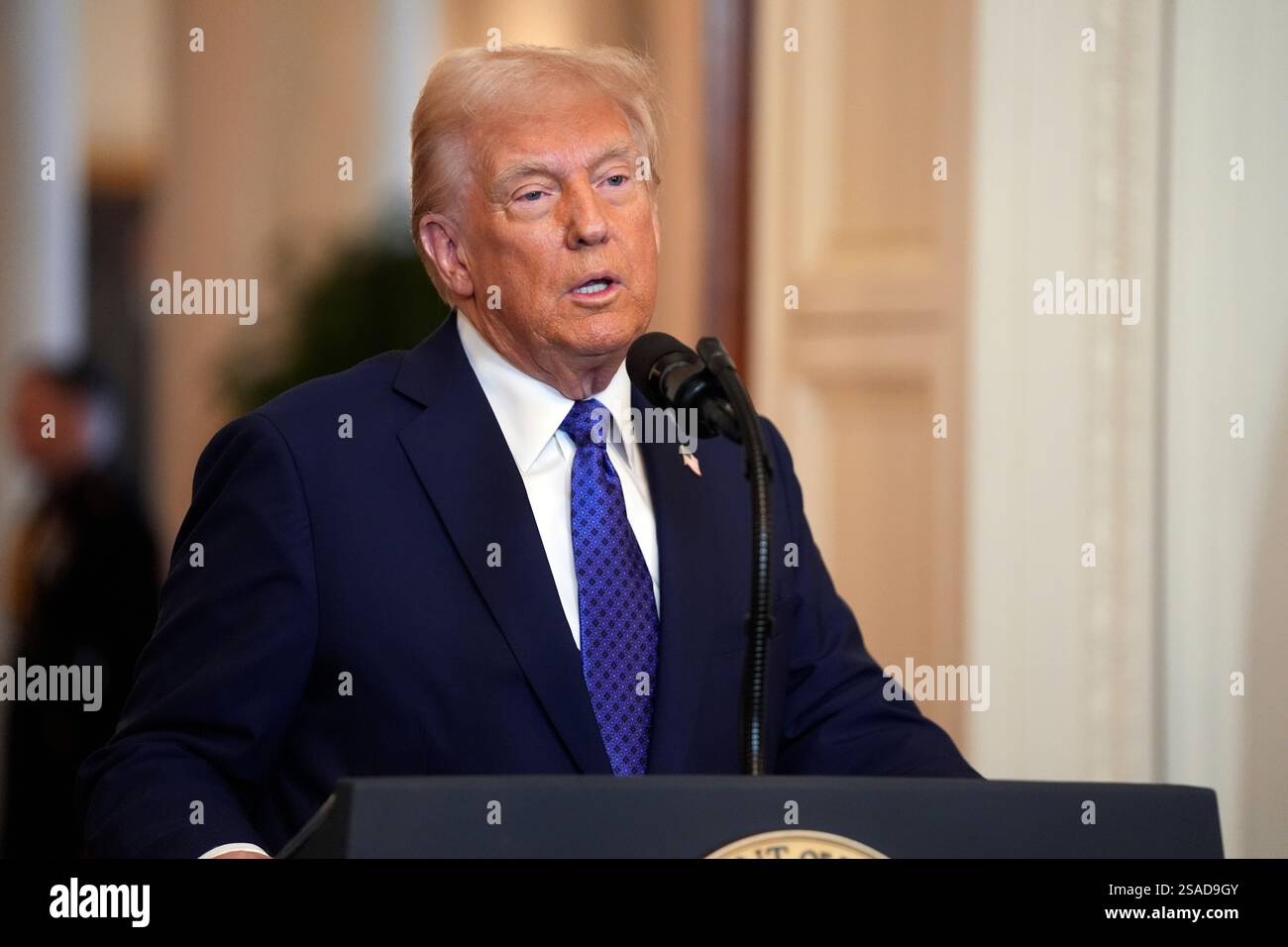 President Donald Trump speaks before signing the Laken Riley Act in the ...
