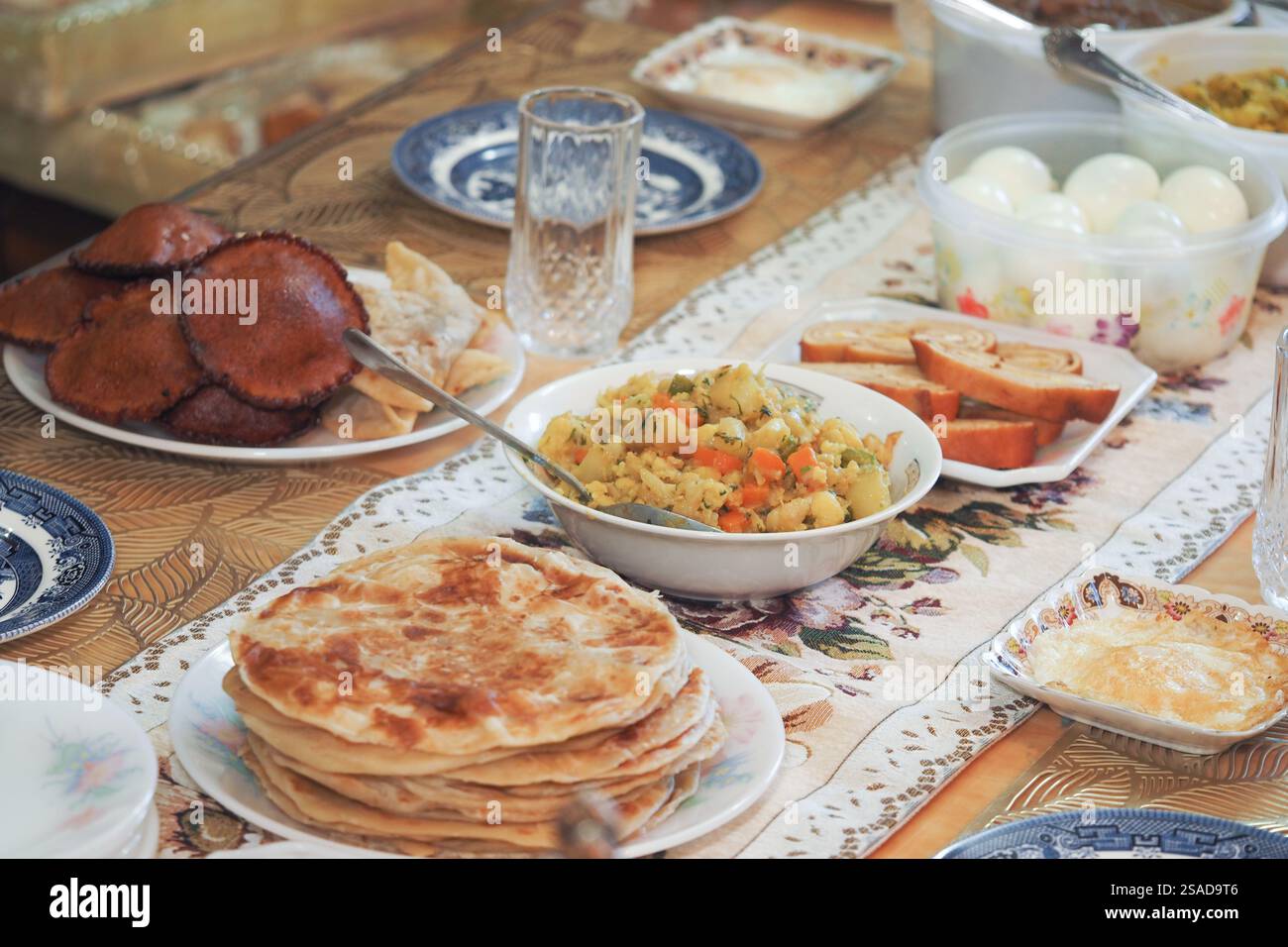 Delicious array of traditional dishes on a dining table Stock Photo - Alamy