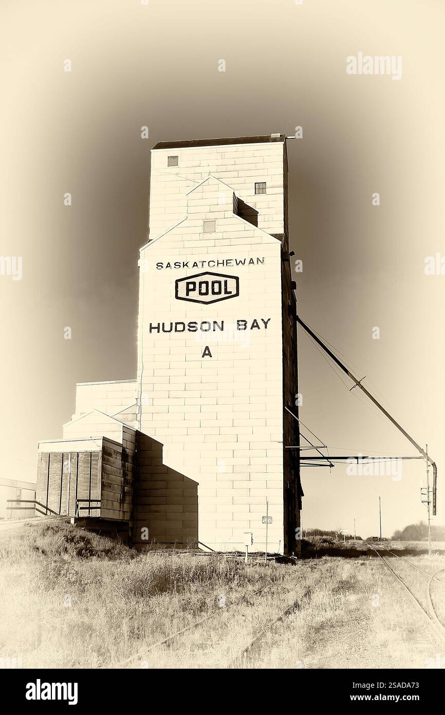 A large grain silo with the name Pool on it. The silo is located in ...