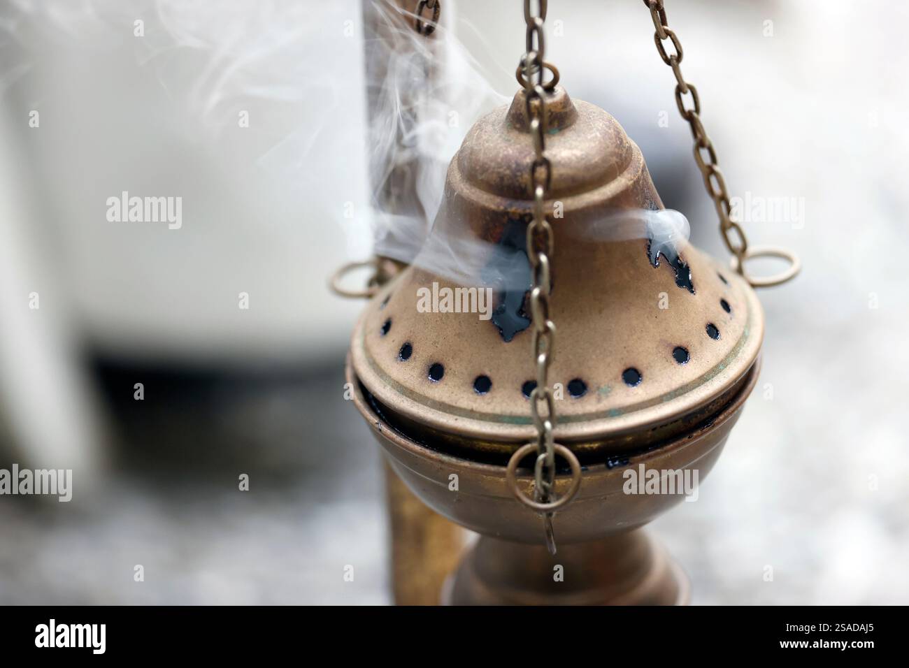 Smoking censer hangs by altar boy. Catholic mass. La Roche sur Foron.. France Stock Photo - Alamy