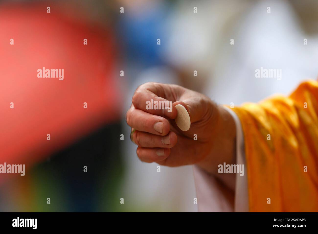 Catholic Mass. Priest giving Communion. Host symbolizing the body of ...