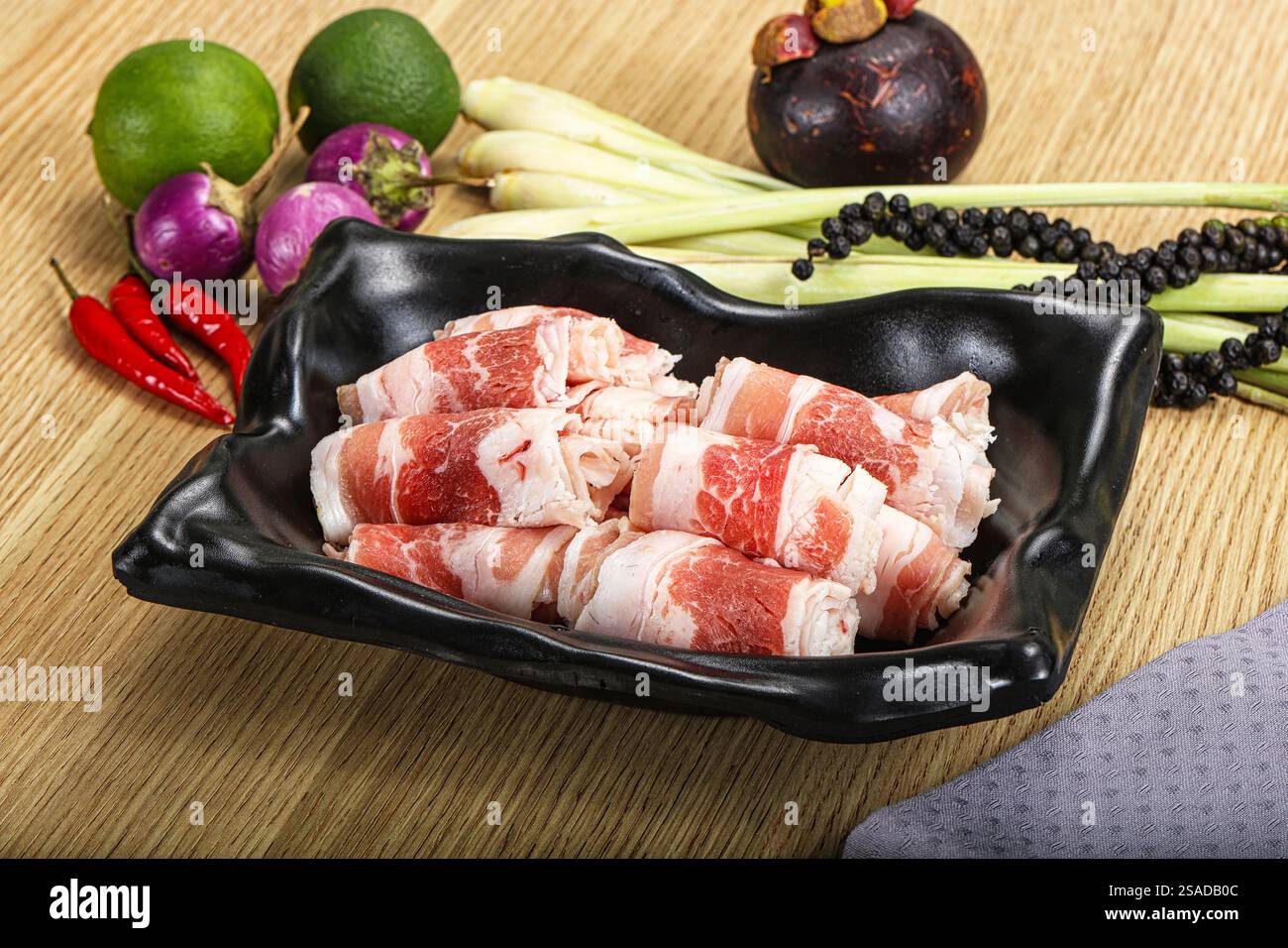 Raw beef bacon roll for grill Stock Photo - Alamy
