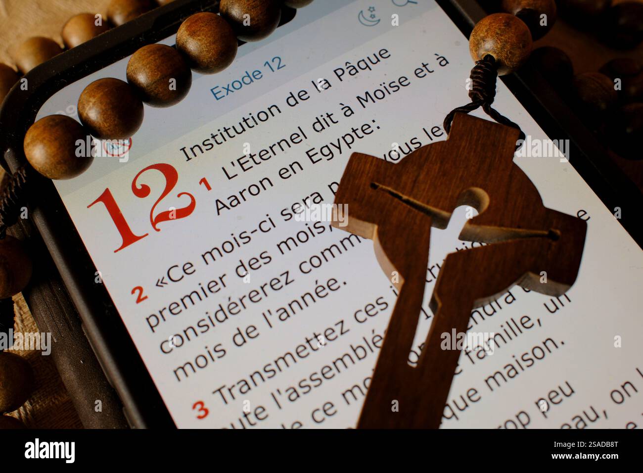 Rosary and digital bible on a smartphone. Old testament. Institution of ...