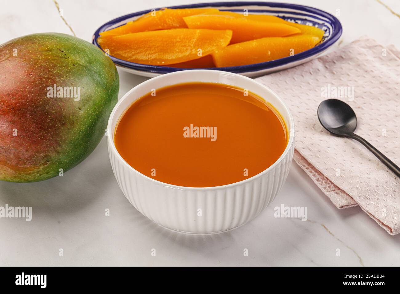Sweet delicous mango puree in the bowl Stock Photo - Alamy