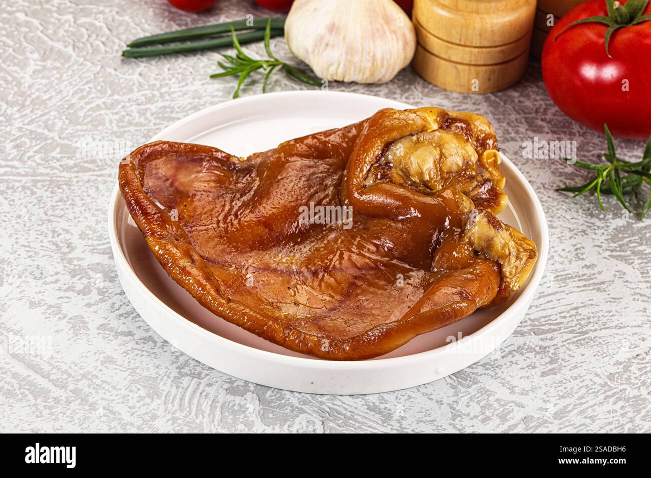 Chinese cuisine - Smoked pork ear snack appetizer Stock Photo - Alamy