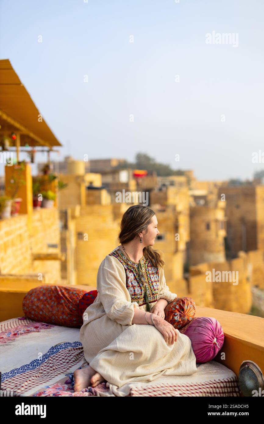 Beautiful woman building sand castle hi-res stock photography and ...