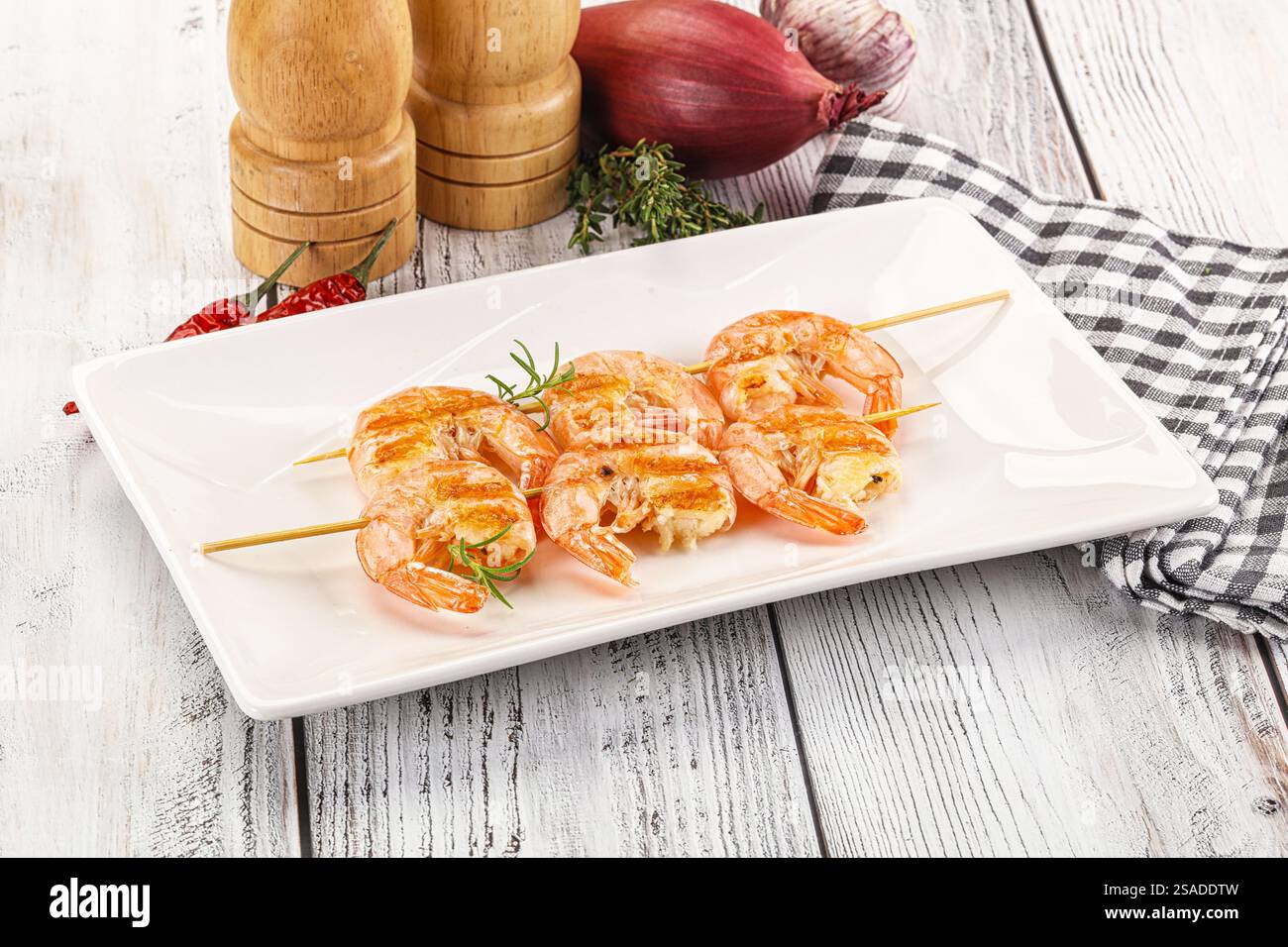 Grilled king prawn skewer snack appetizer Stock Photo - Alamy
