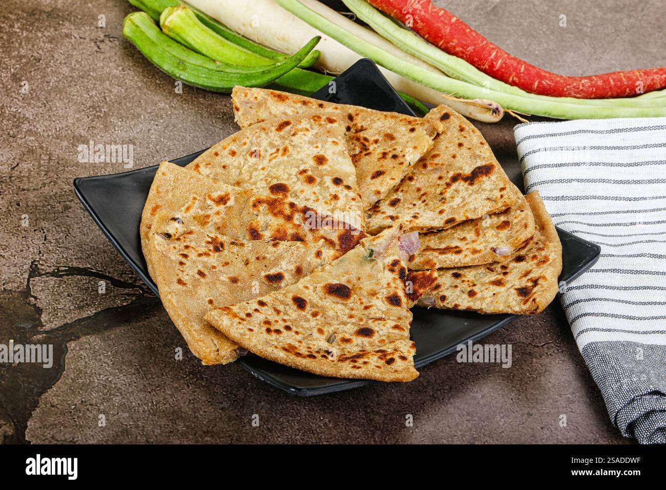 Indian vegetarian Aloo Paratha - bread with potato Stock Photo - Alamy