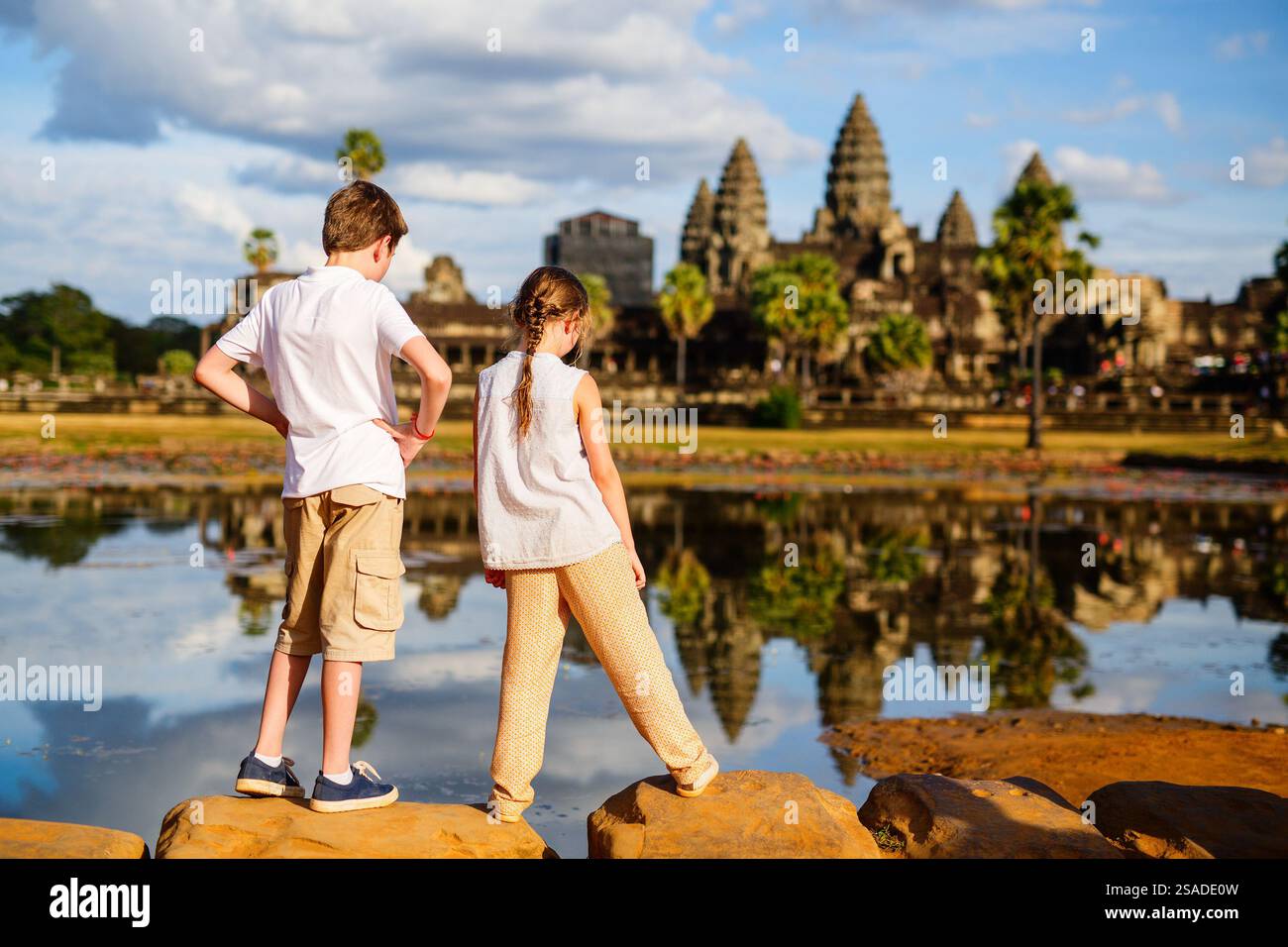 Kids at ancient Angkor Wat temple in Siem Reap in Cambodia Stock Photo ...