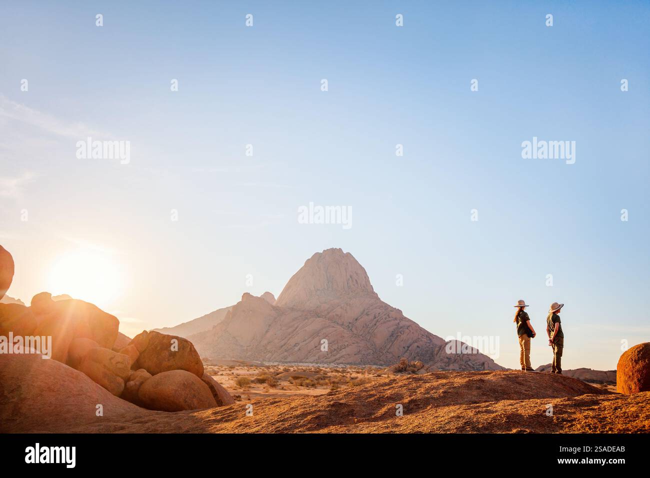 Kids brother and sister exploring Spitzkoppe with unique rock ...