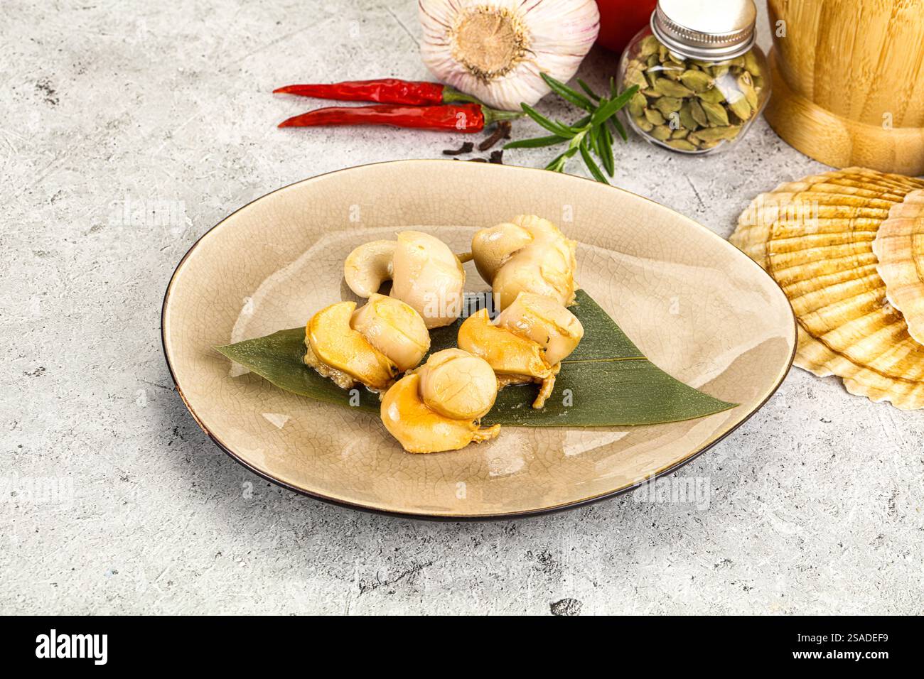 Delicous luxury baked seafood scallops in the plate Stock Photo - Alamy