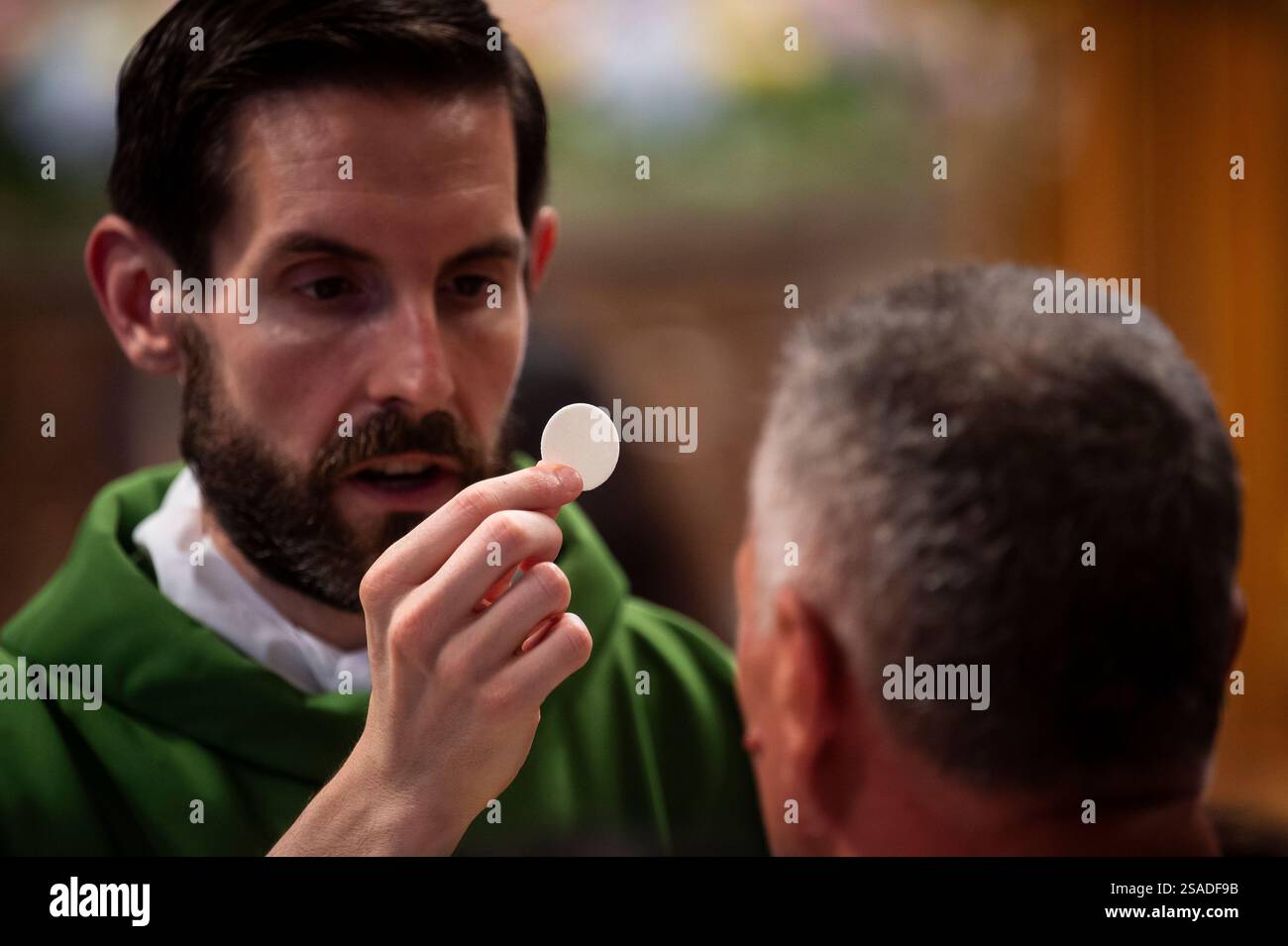 The Holy communion. Catholic mass Stock Photo - Alamy