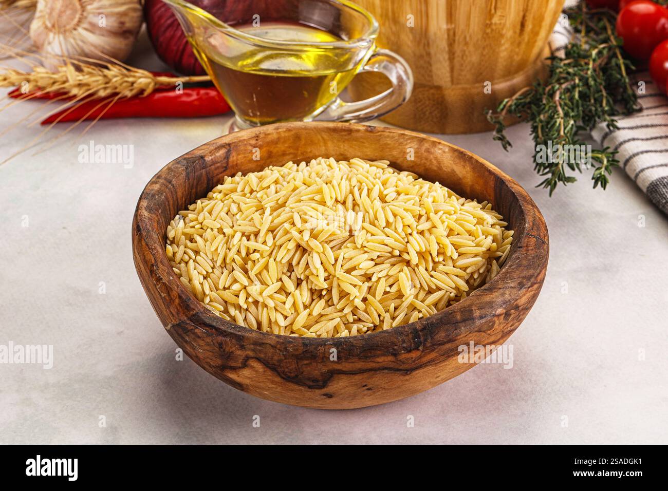 Italian raw dry pasta risoni for cooking Stock Photo - Alamy