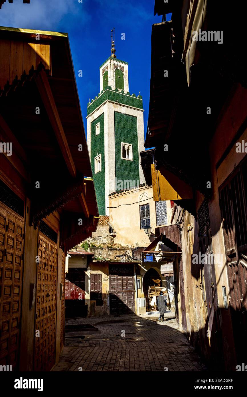 Great mosque minaret towering over Meknes medina, Morocco Stock Photo ...
