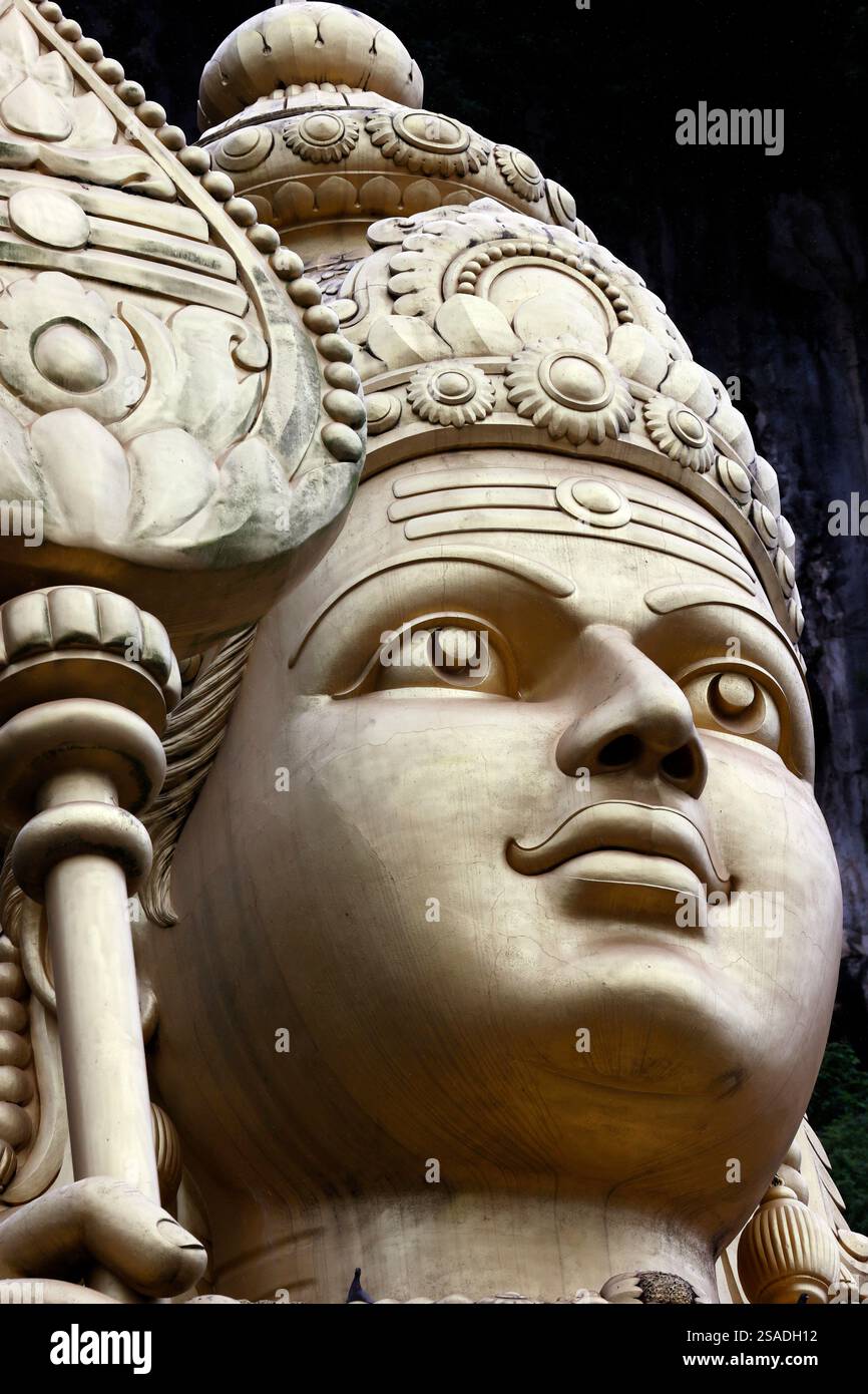 Murugan the Hindu God of war and victory. Massive statue at Batu Caves ...
