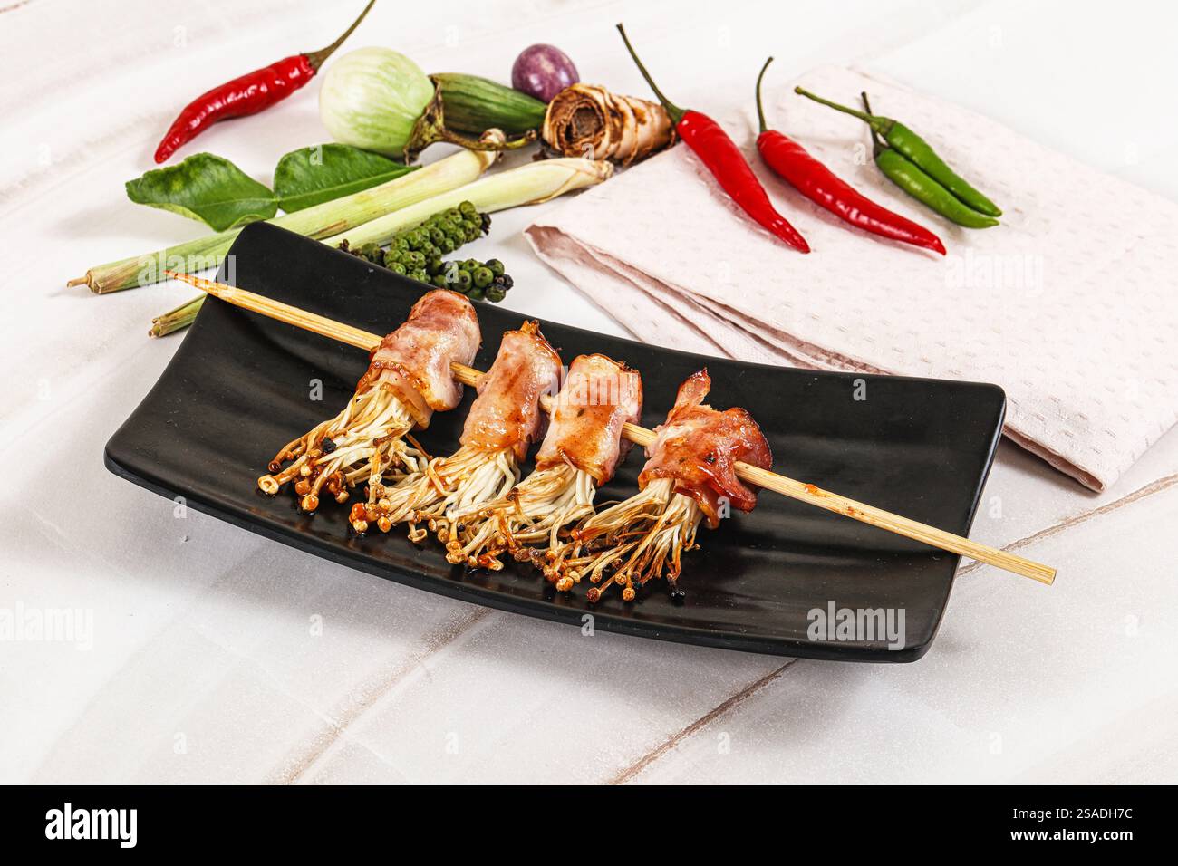 Thai Street foof satay with bacon and mushroom enoki skewer Stock Photo ...