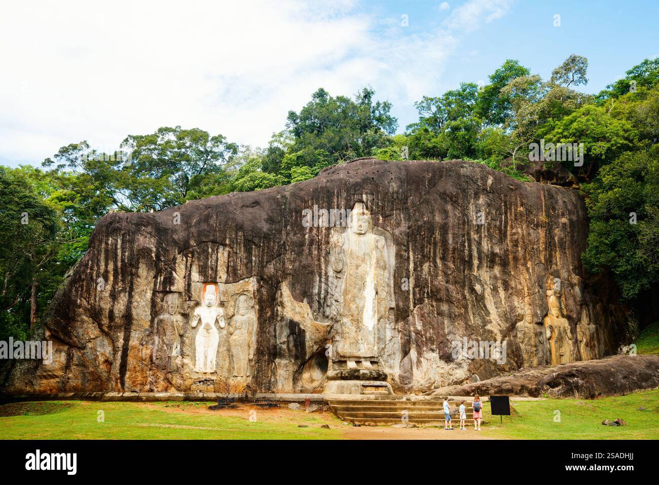Family of mother and kids visiting Buduruwagala temple with well ...
