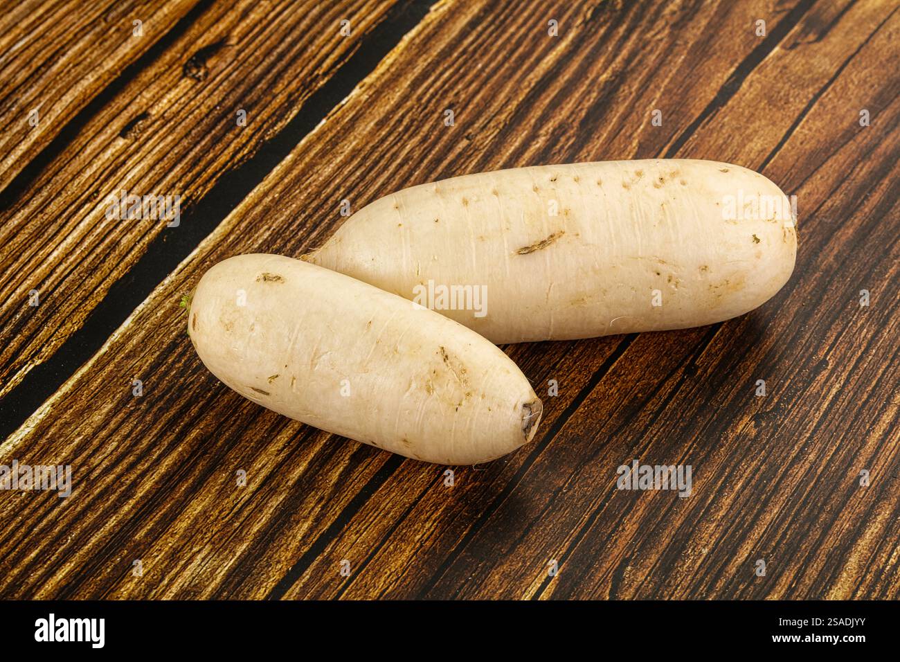 Raw white daikon raddish root for cooking Stock Photo - Alamy