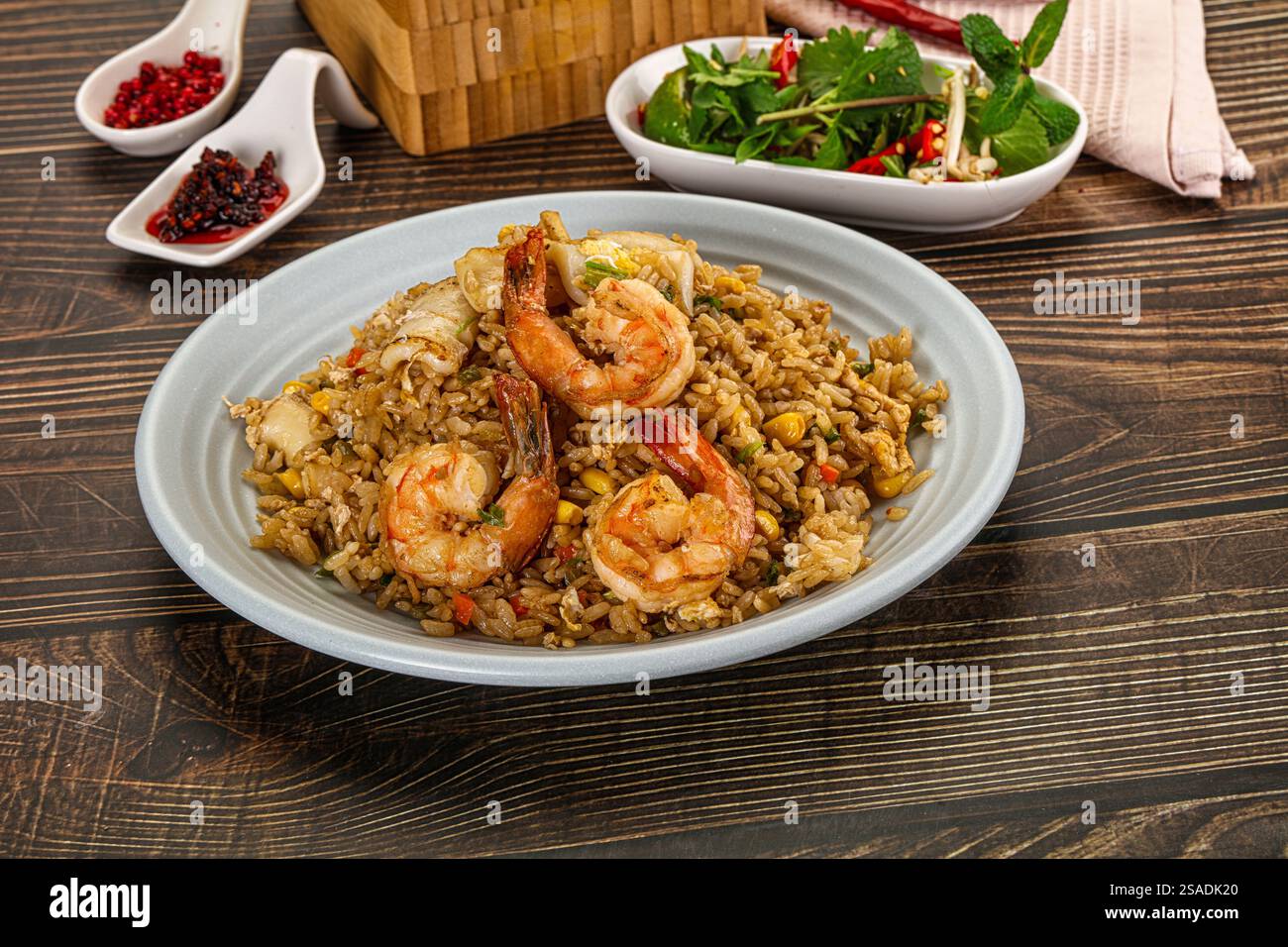 Vietnamese traditional fried rice with prawn and squid - Kom Ran Stock ...