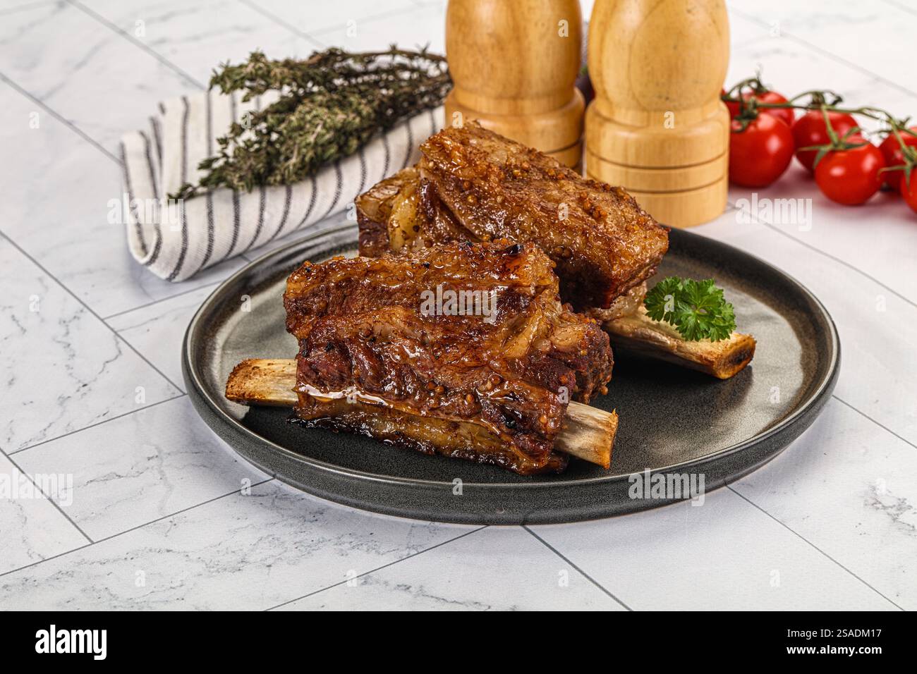 Baked beef ribs with marinade with seasoning Stock Photo - Alamy