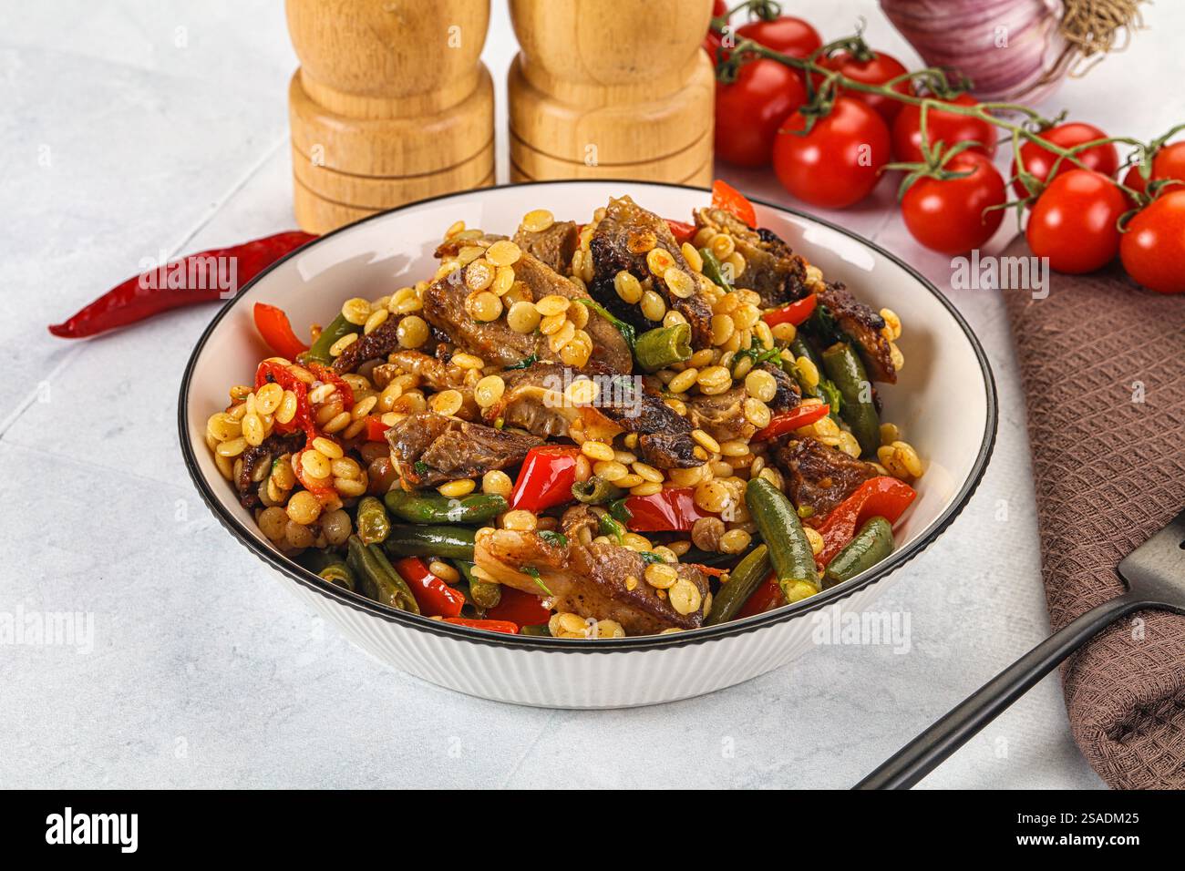 Eastern cuisine - Ptitim with beef meat and vegetables Stock Photo - Alamy