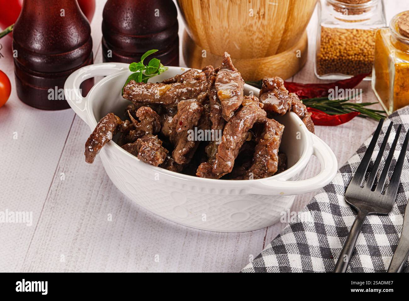 Stew beef slices with gravy Beef Stroganoff Stock Photo - Alamy