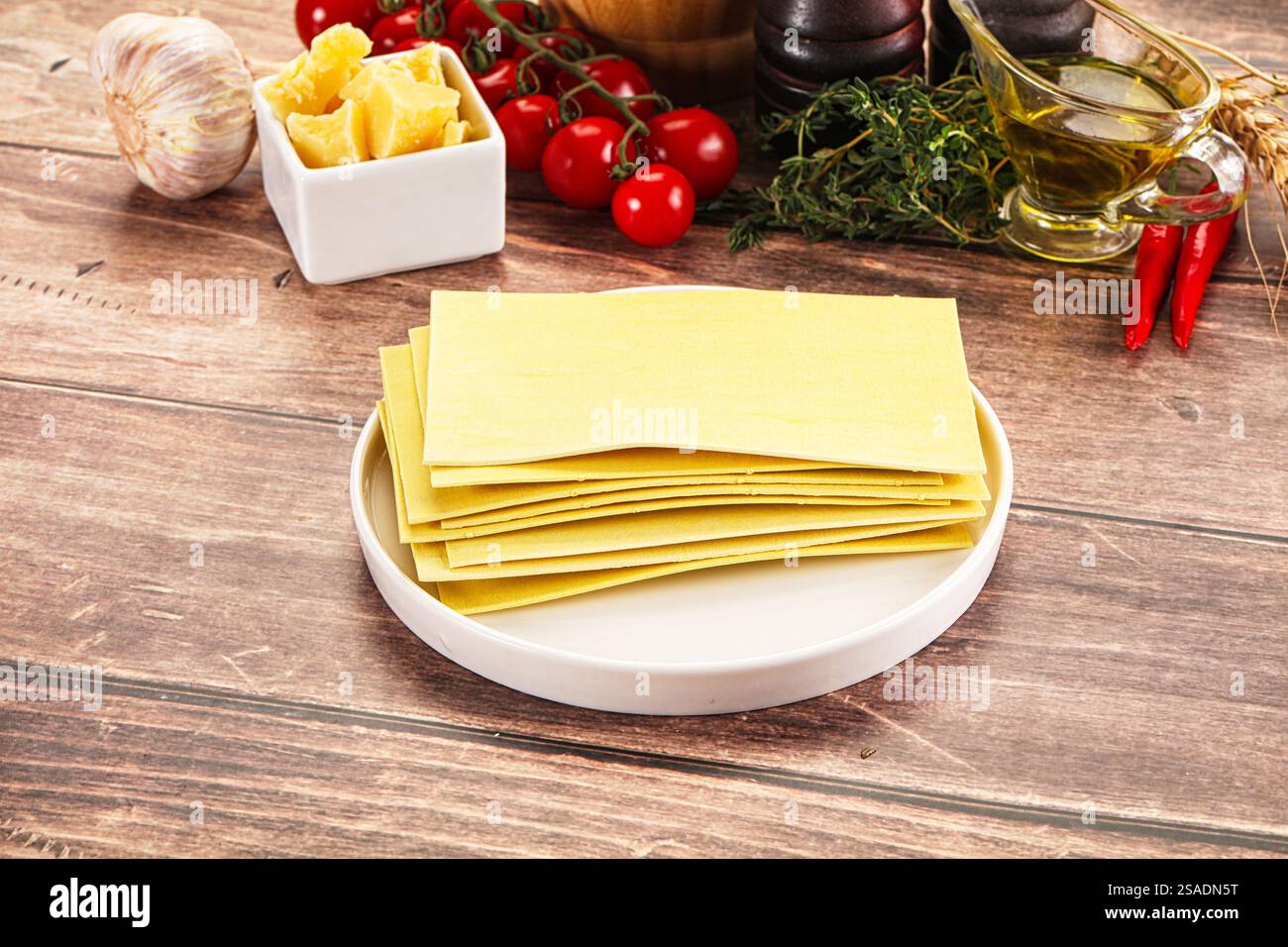 Italian cuisine - dry lasagna sheets for cooking Stock Photo - Alamy