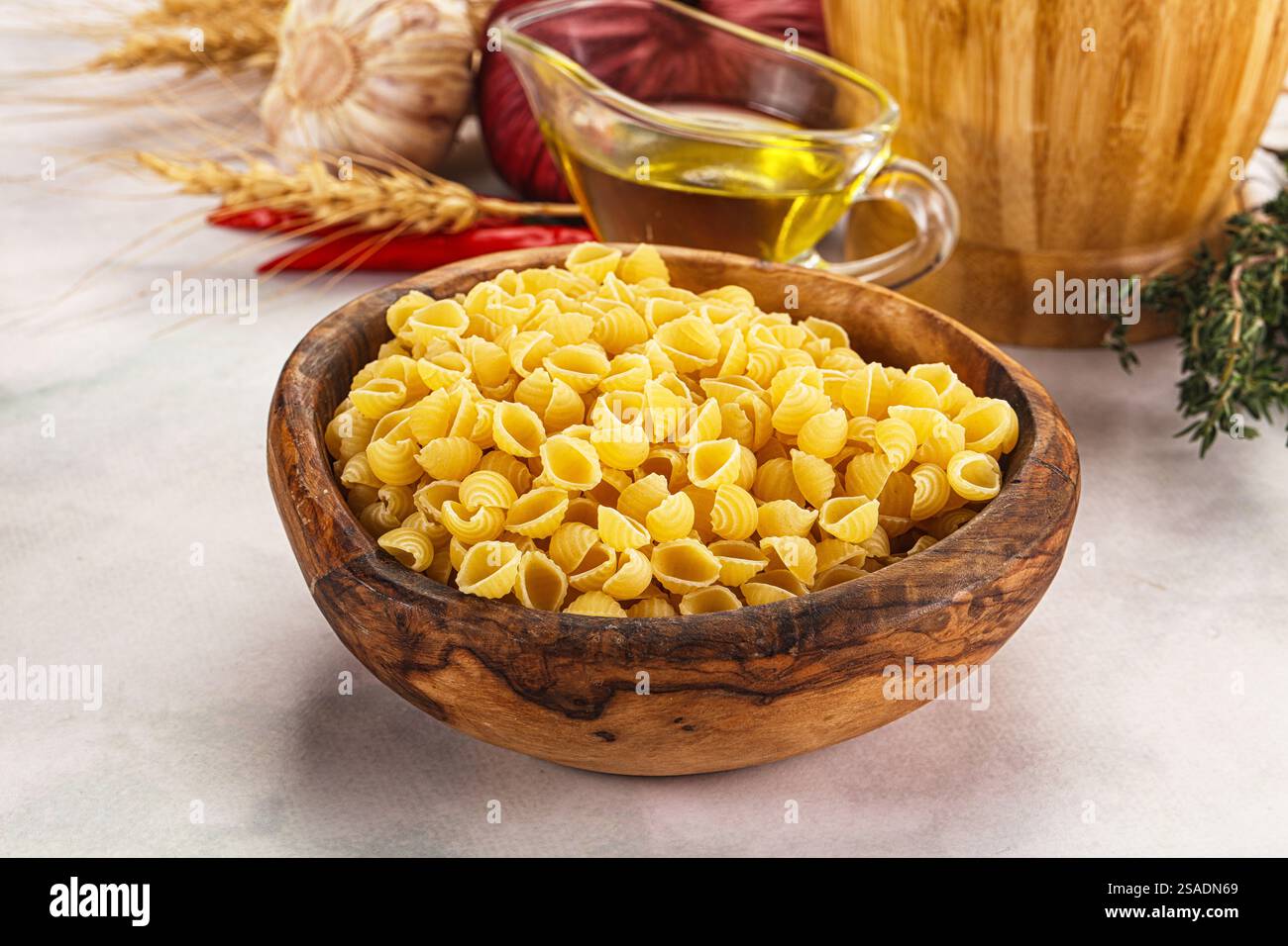 Italian cuisine - dry conchiglie shell pasta Stock Photo - Alamy