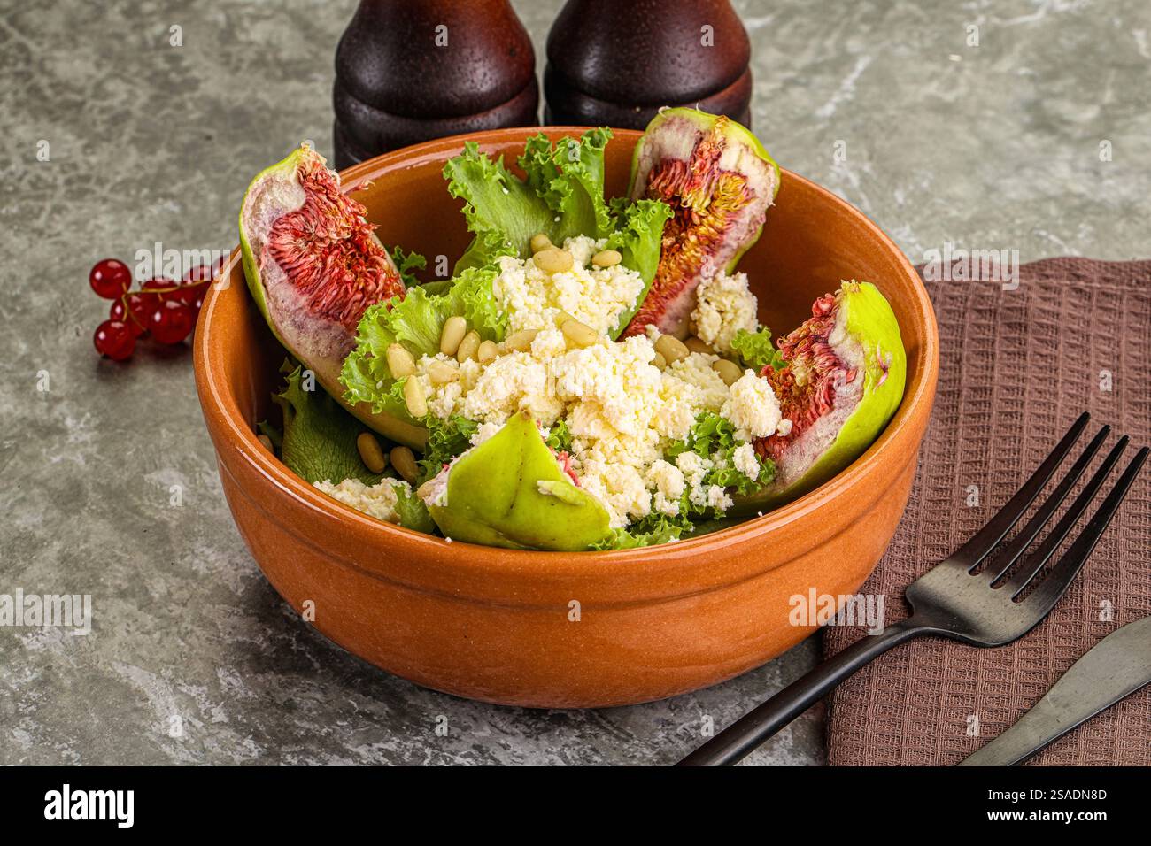 Salad with fig and sheep cottage cheese Stock Photo - Alamy